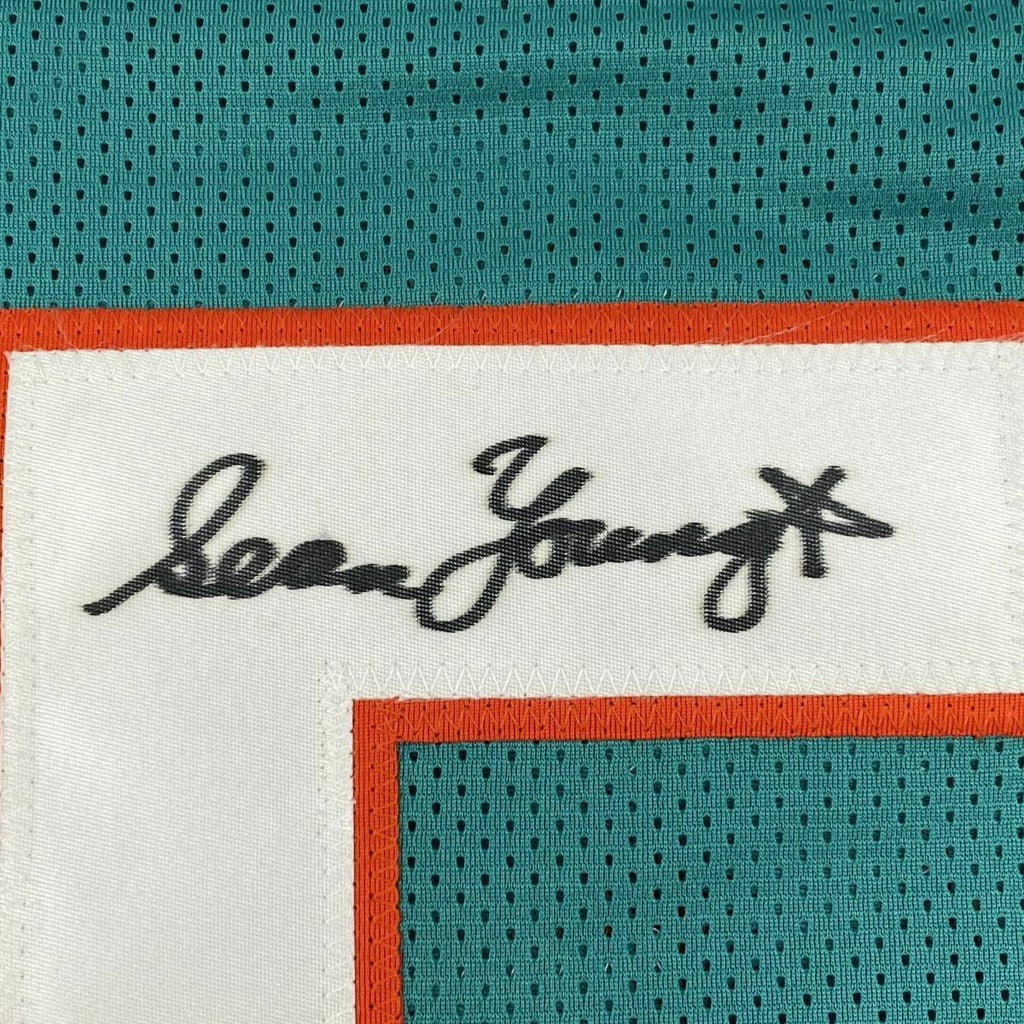 Autographed/Signed SEAN YOUNG Ray Finkle Ace Ventura Miami Teal Jersey ...